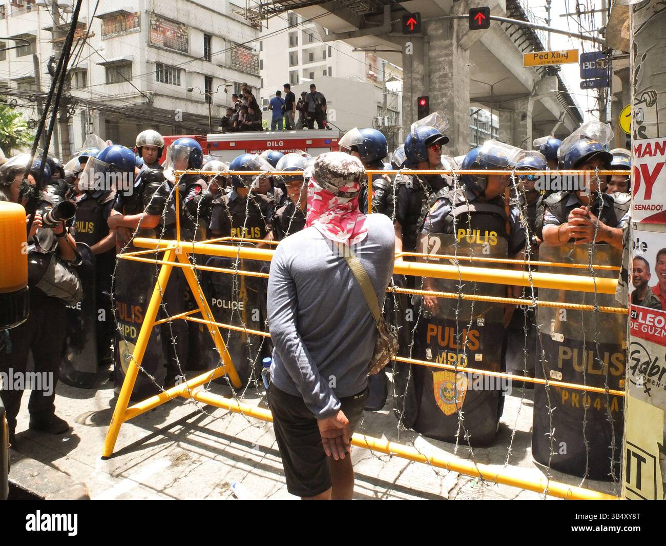 Manila, Philippines. 01st May, 2025. A protester stands infront of the ...