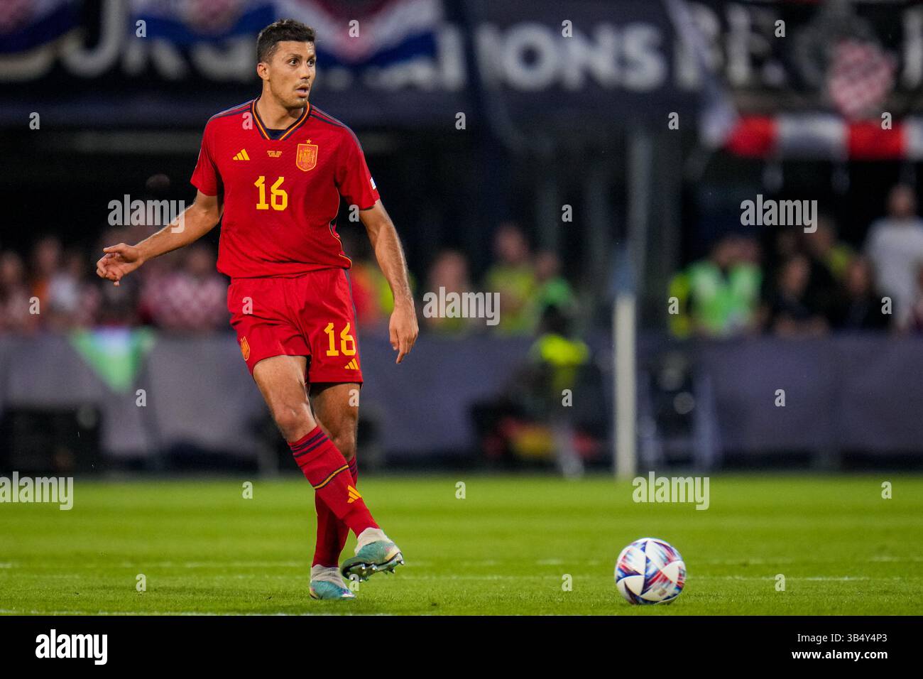 ROTTERDAM, NETHERLANDS - JUNE 18: Rodri of Spain passes the ball during ...