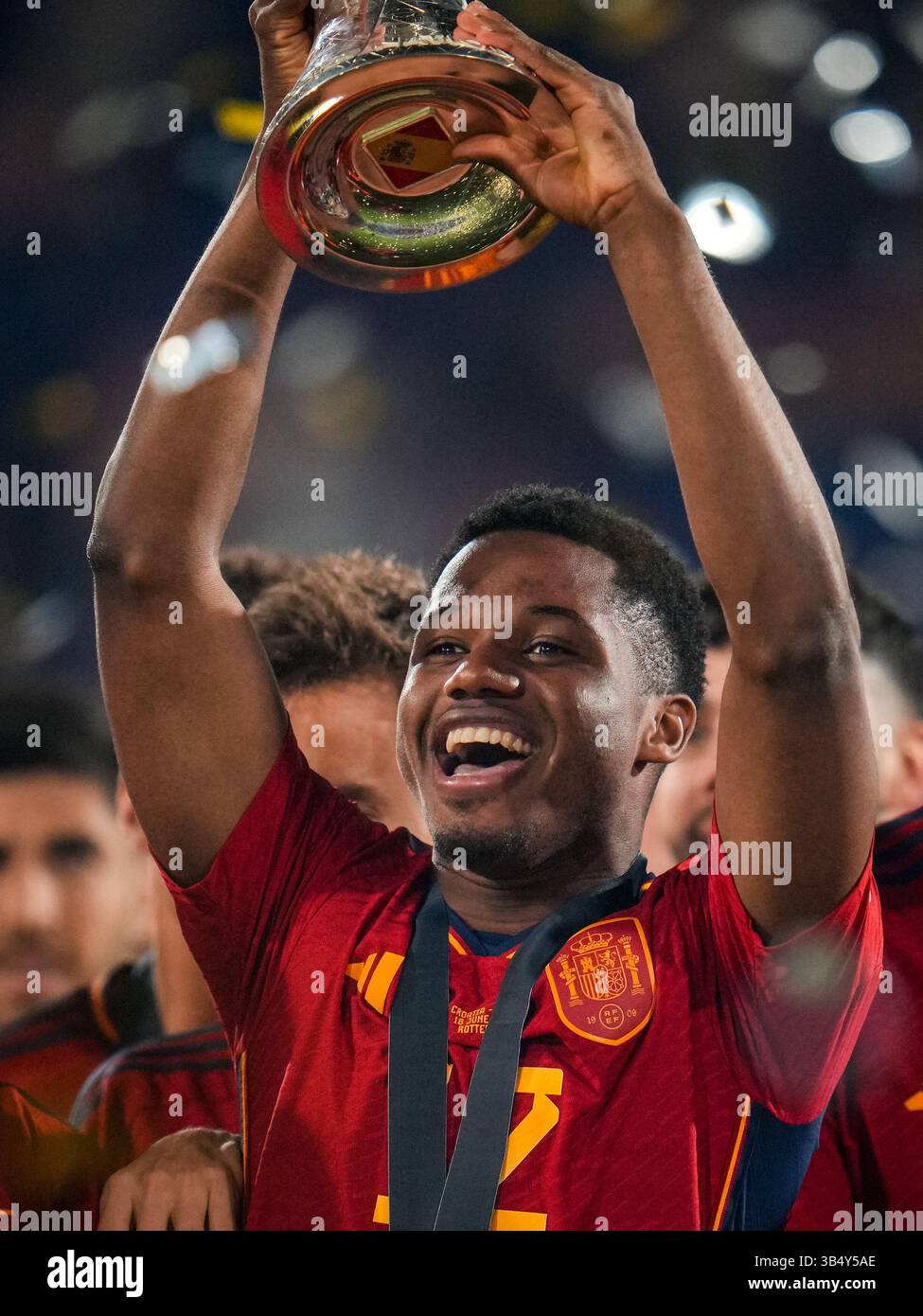 ROTTERDAM, NETHERLANDS - JUNE 18: Ansu Fati of Spain lifts up the UEFA ...
