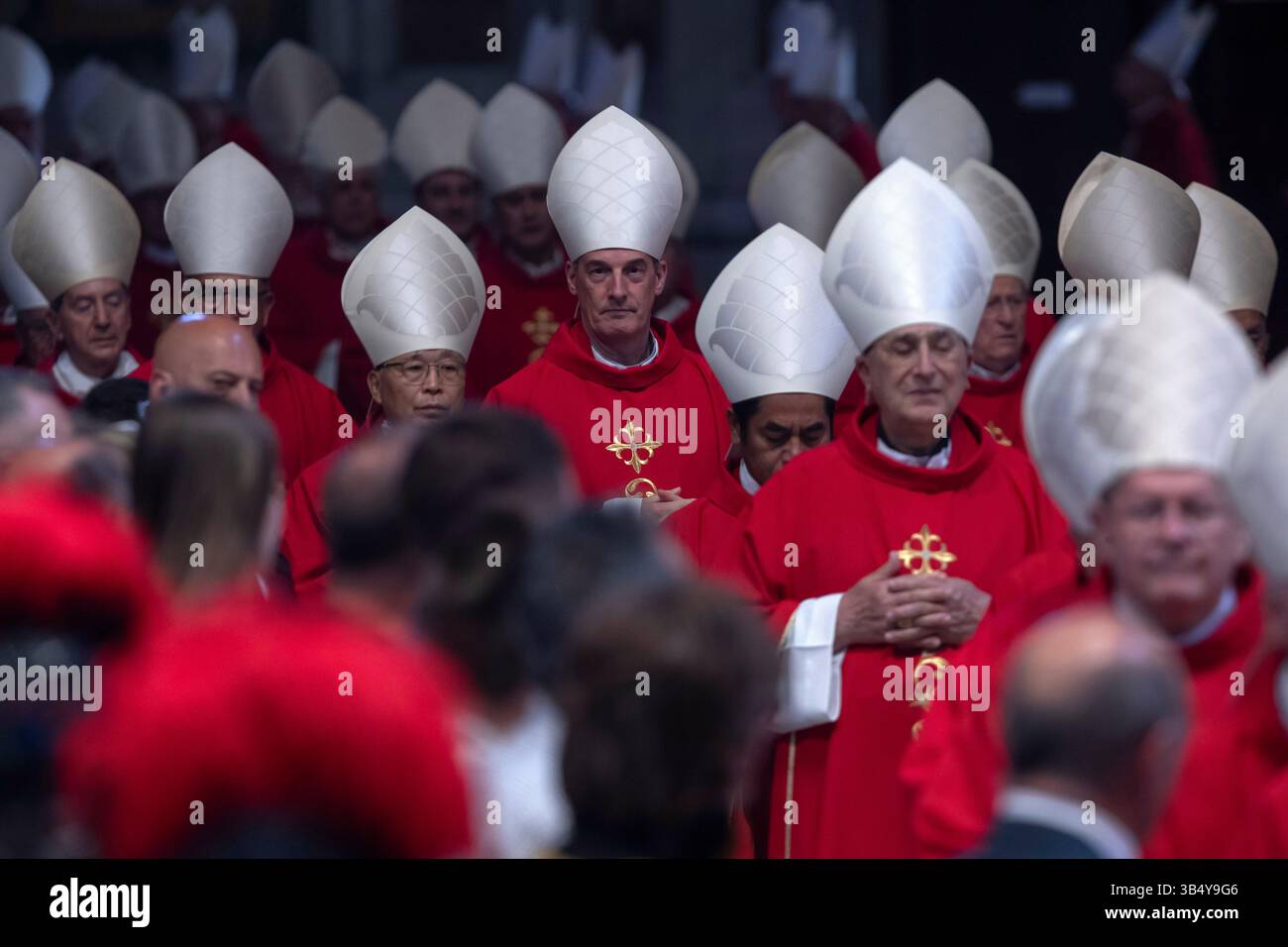 Cardinal François-Xavier Bustillo arrives to attend mass on the fourth ...