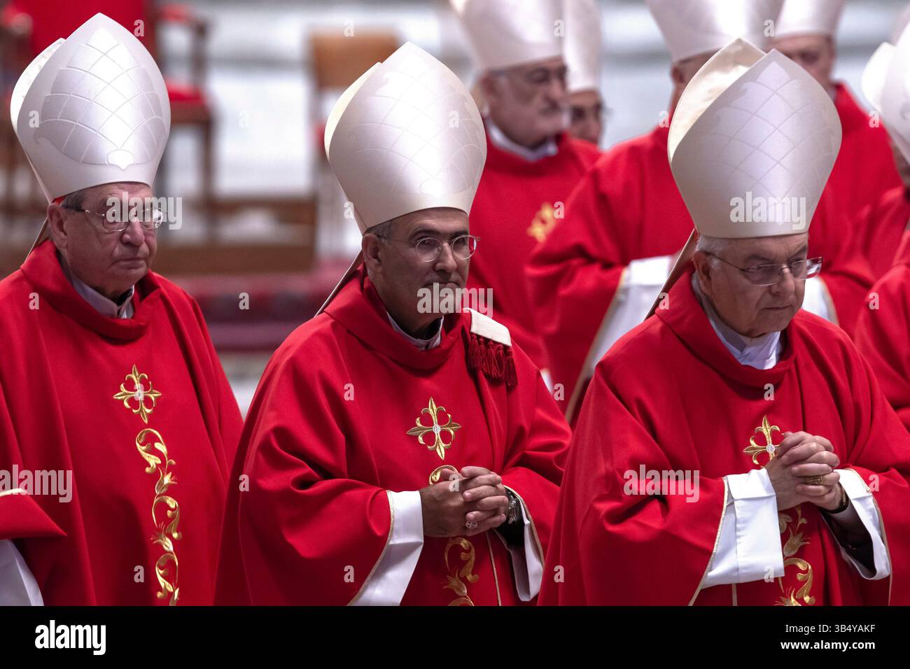 Cardinal José Tolentino de Mendonça (center) leaves at the end of a ...