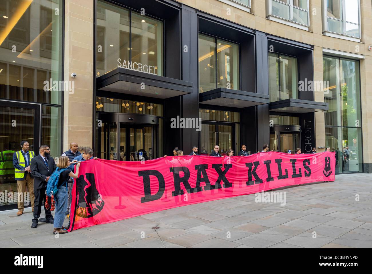 London, UK. 01 MAY, 2025. "Drax kills" banner is held outside as AXE ...