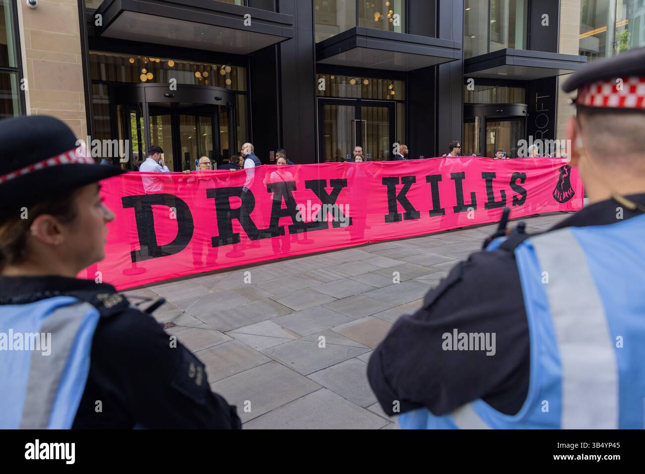 London, UK. 01 MAY, 2025. "Drax kills" banner is held outside as AXE ...
