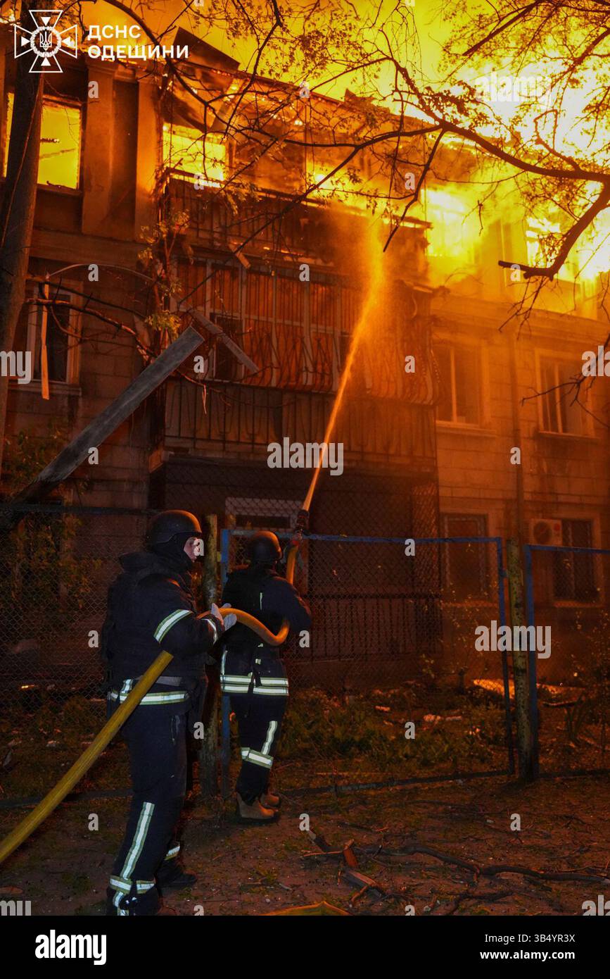 In this photo provided by the Ukrainian Emergency Service, firefighters ...