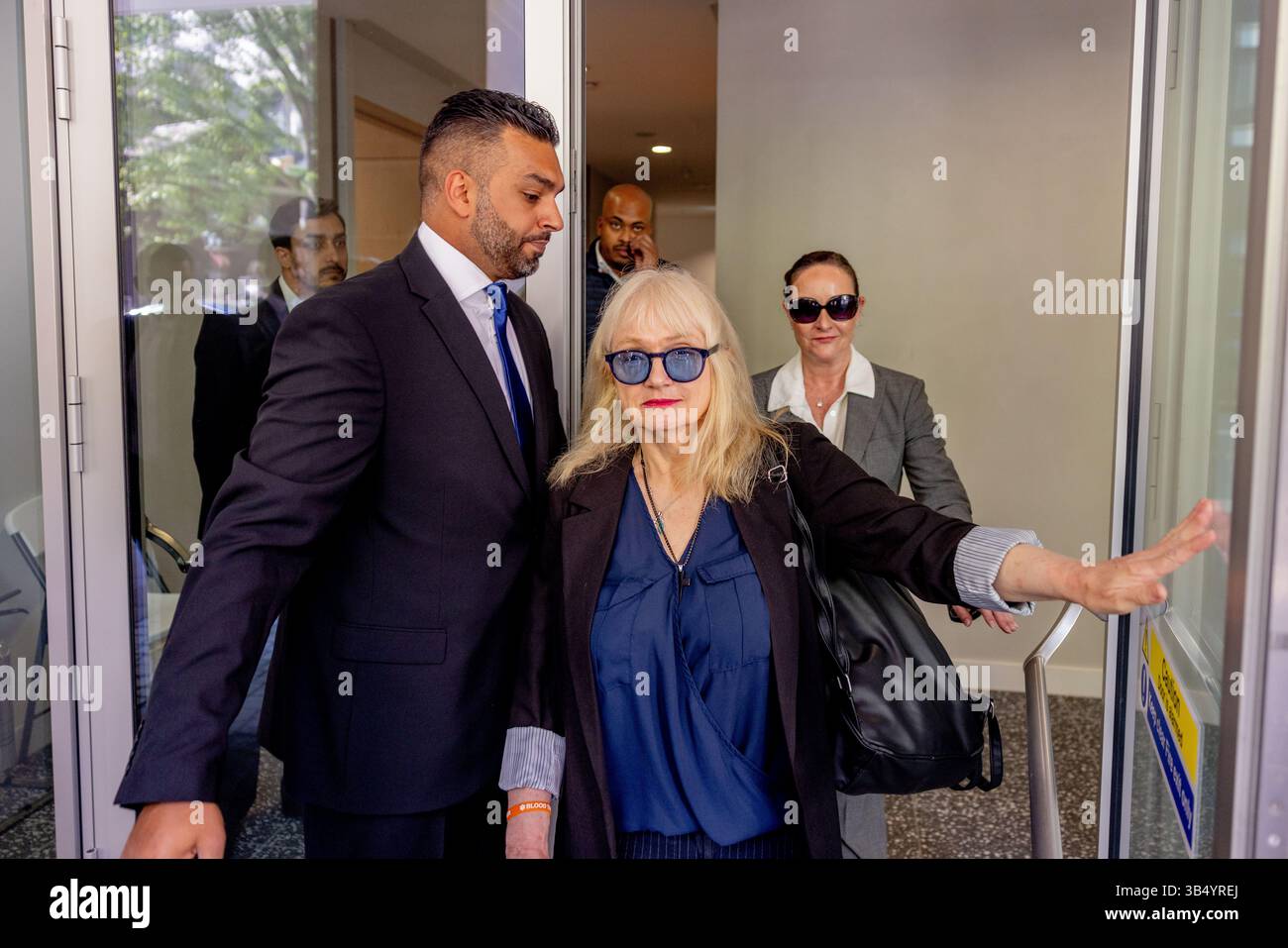 London, UK. 01 MAY, 2025. A protestor who blocked a revolving door is ...