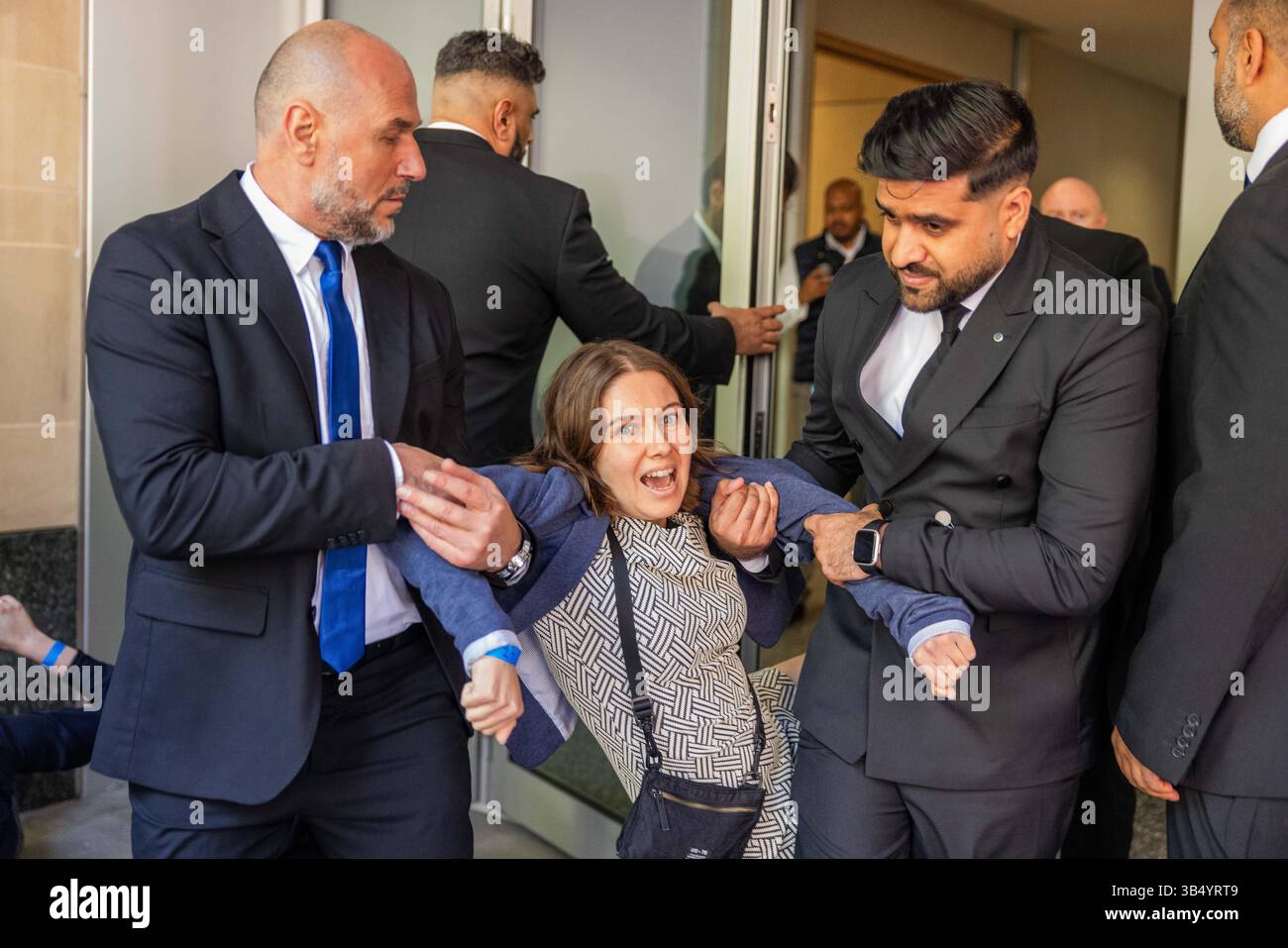 London, UK. 01 MAY, 2025. Protestor is removed as AXE DRAX activists ...