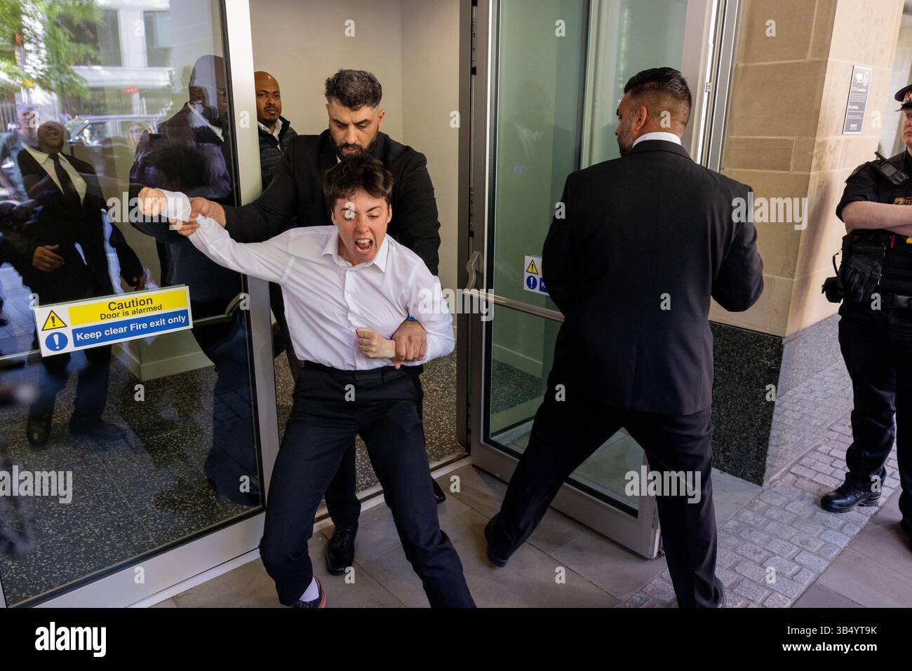 London, UK. 01 MAY, 2025. Protestor is removed as AXE DRAX activists ...