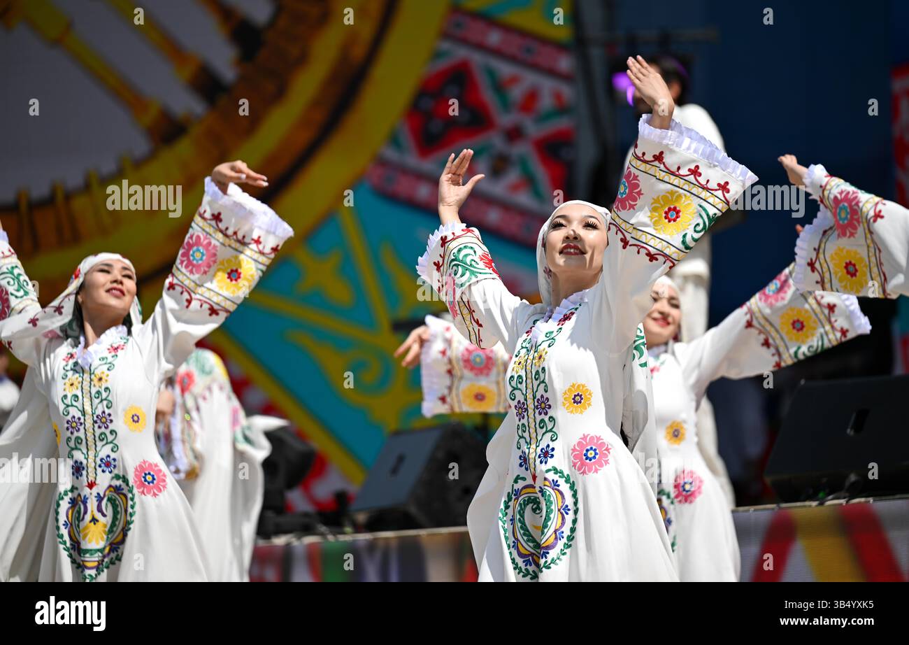 Almaty, Kazakhstan. 1st May, 2025. Actresses perform dance during a festival celebrating ...