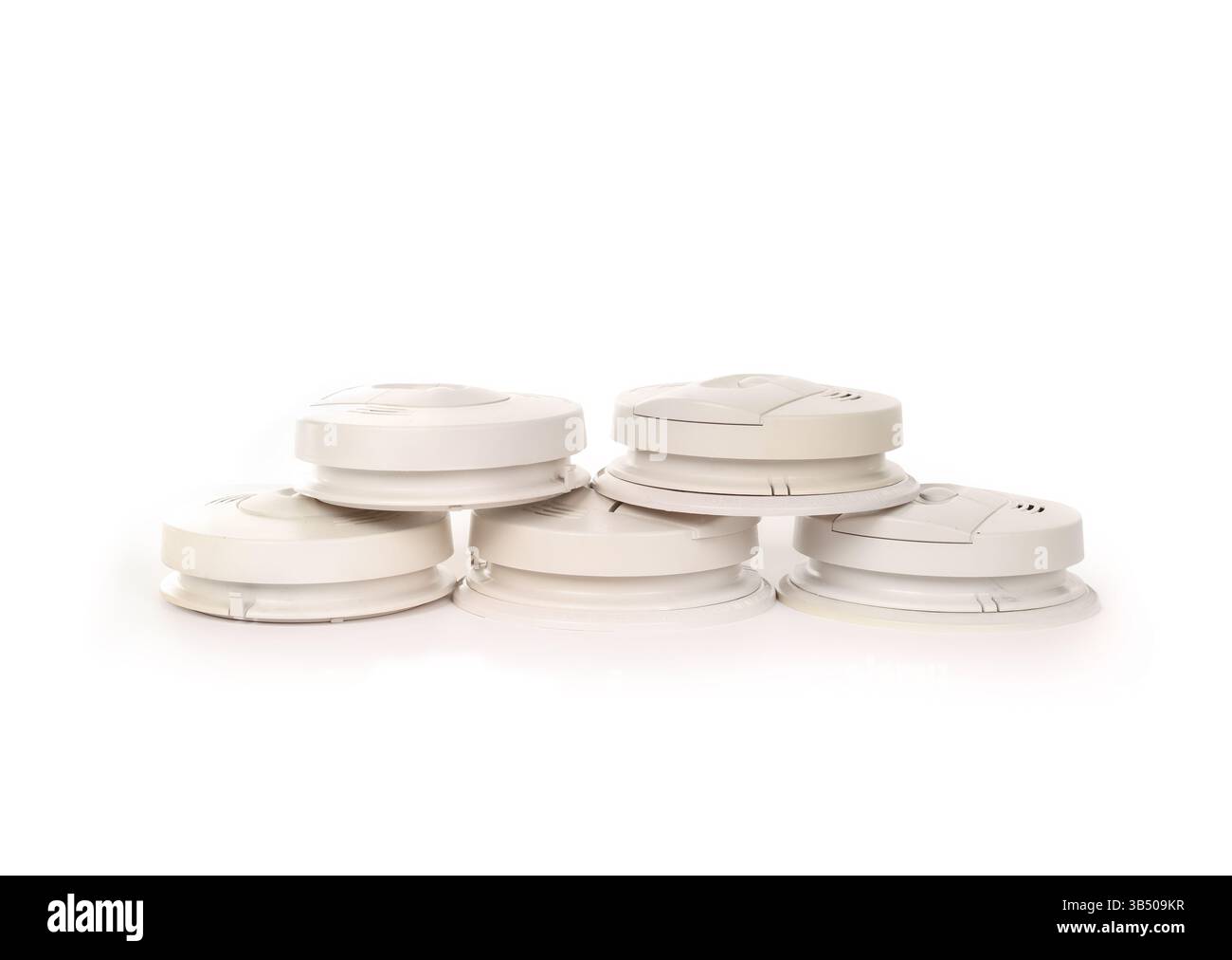 Many smoke detector with carbon monoxide alarm. Stack of old smoke ...