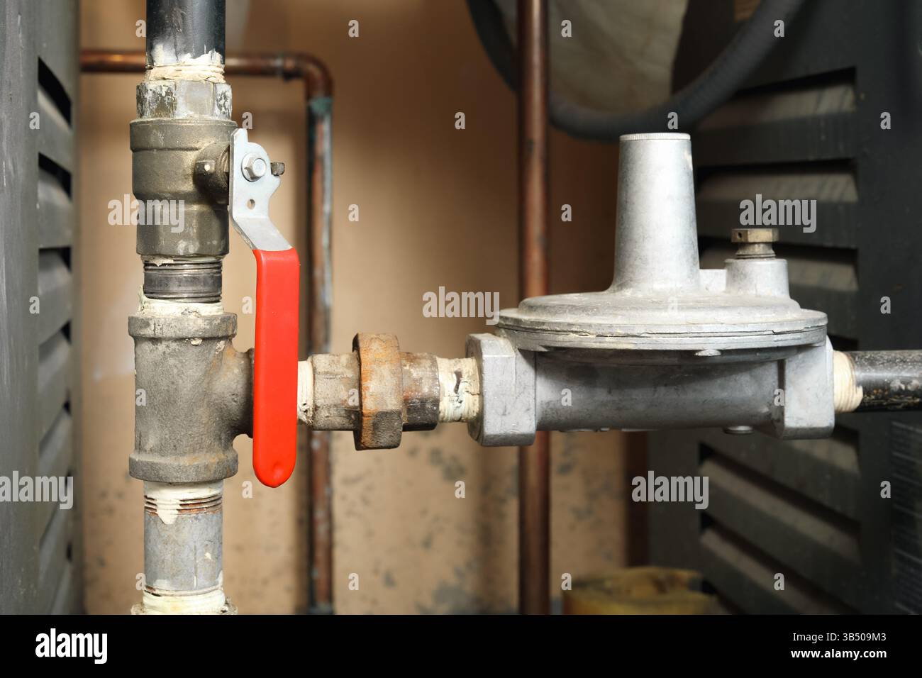 Natural gas shut-off valve in front of gas pressure regulator. Natural ...