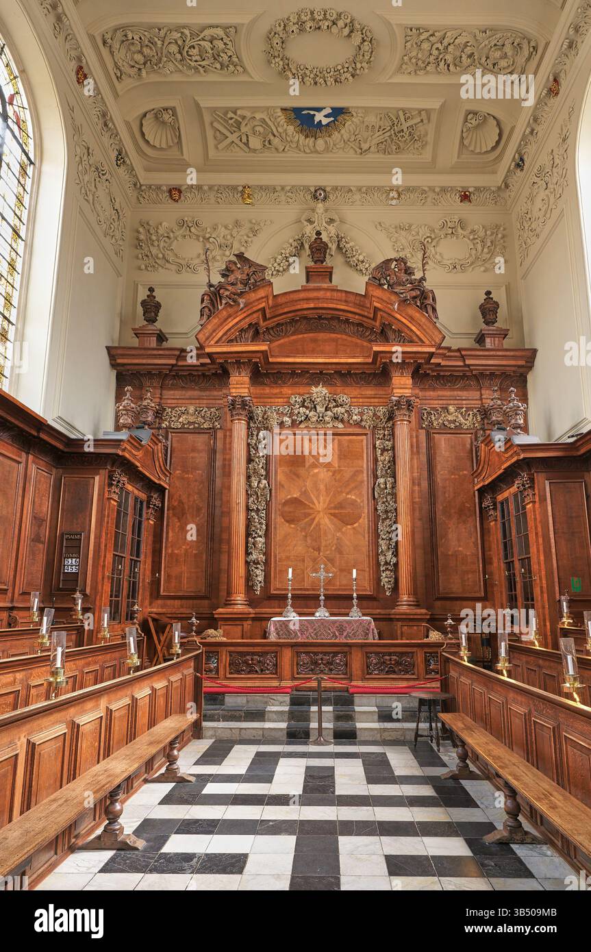 Altar and wooden reredos in the chapel at Trinity College, University ...