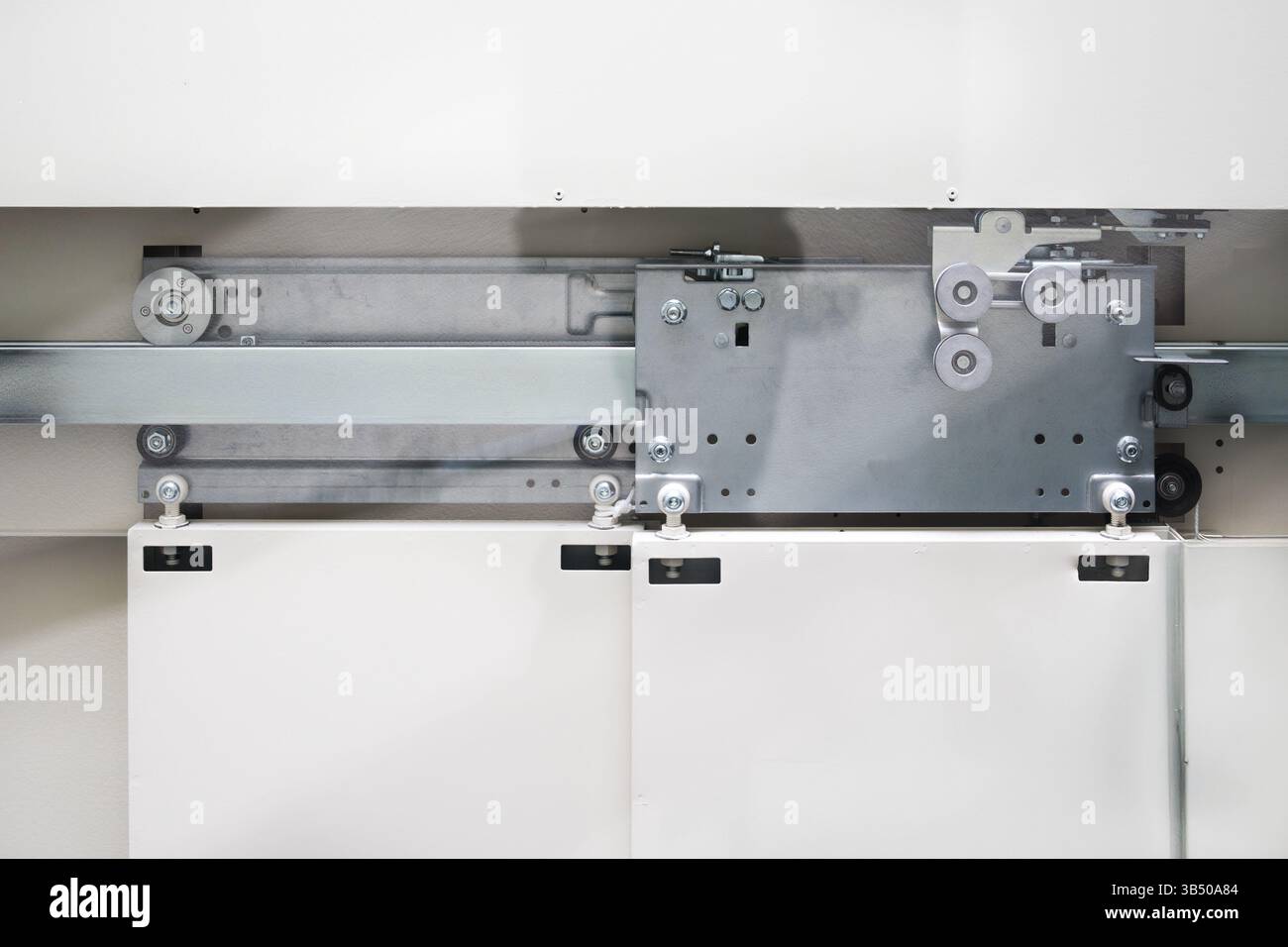 Elevator lockmodul or pulley hanger on sliding door. Lift or elevator ...