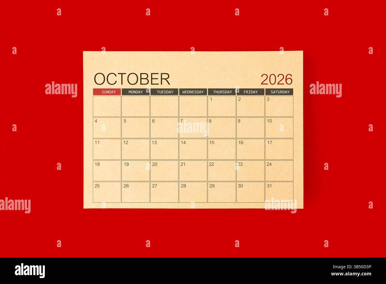 October 2026 desk calendar made from brown paper page on red color ...