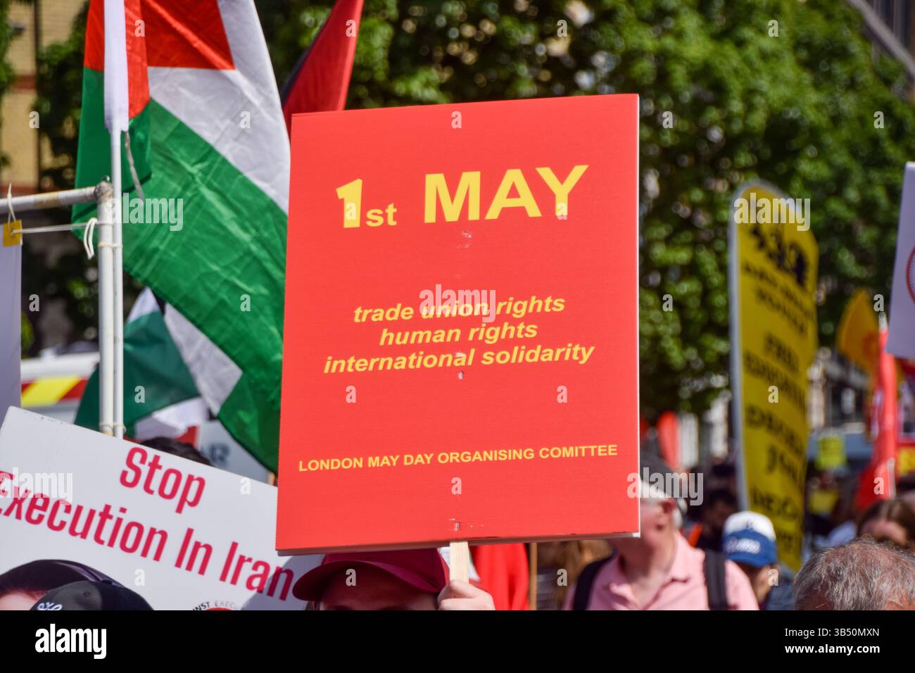 London, UK. 1st May 2025. The May Day march passes through Clerkenwell ...
