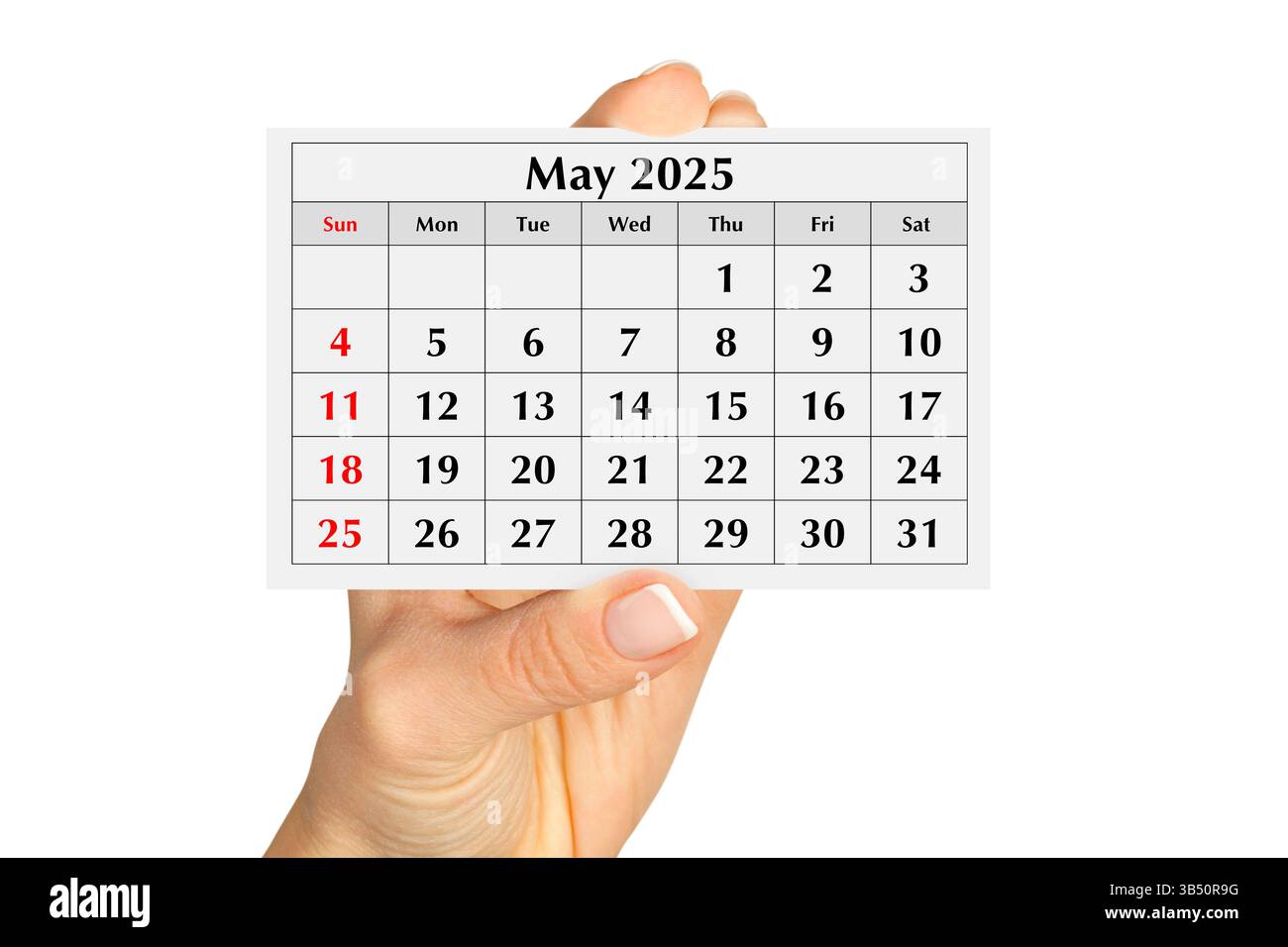 Page of the annual monthly calendar may 2025 in hand. Isolated on white ...