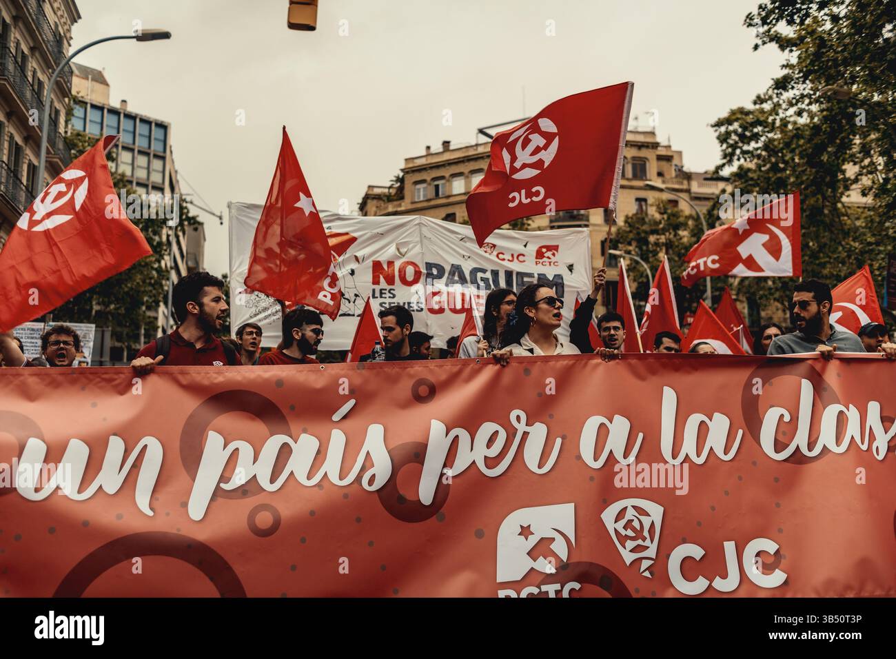 Barcelona, Spain. 1st May, 2025. Communists demonstrate for the working ...