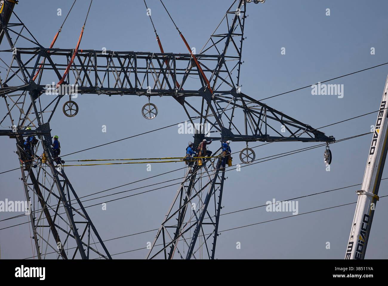 Construction & installation of a high-voltage line to supply power to ...