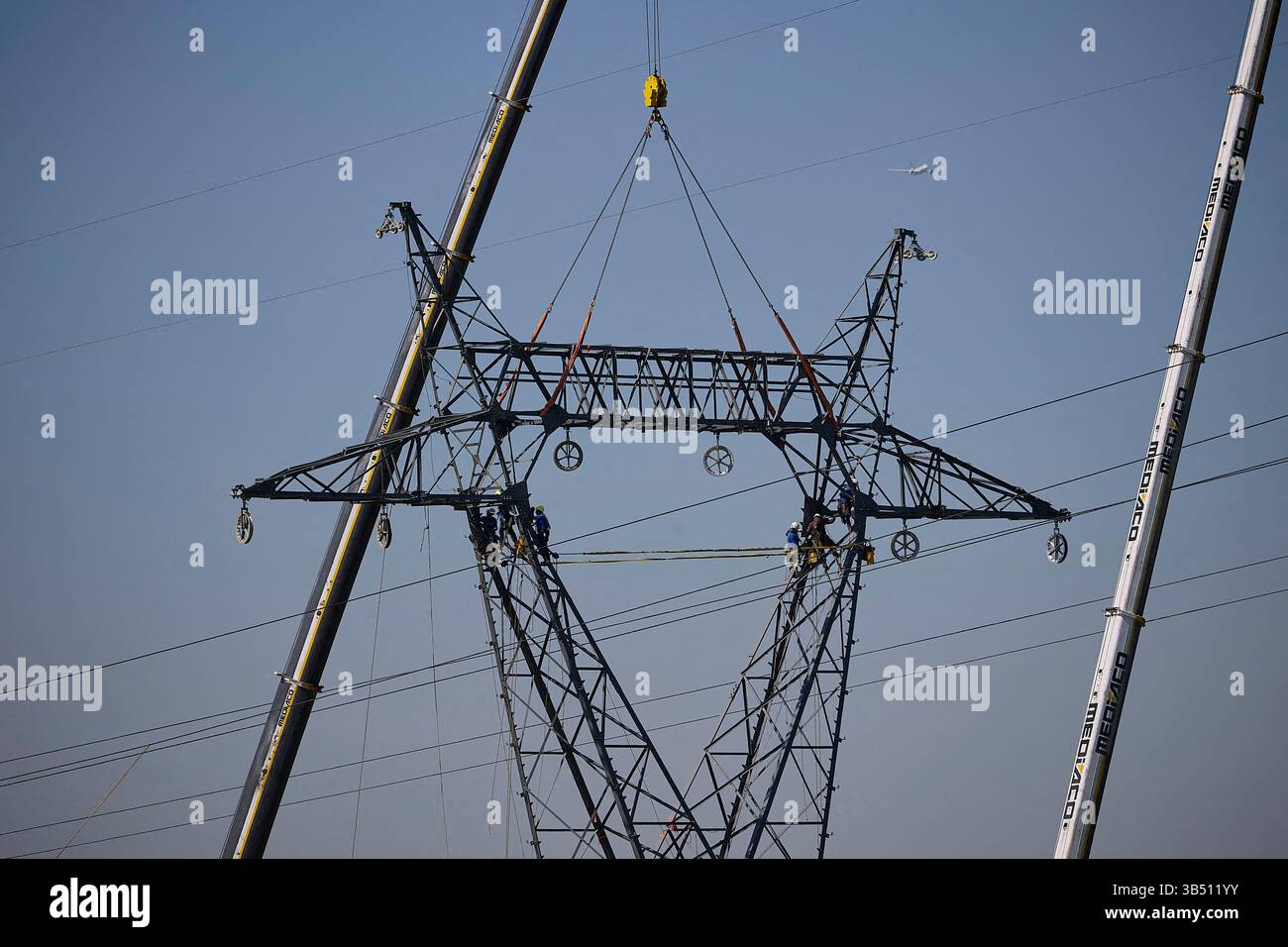 Construction & installation of a high-voltage line to supply power to ...