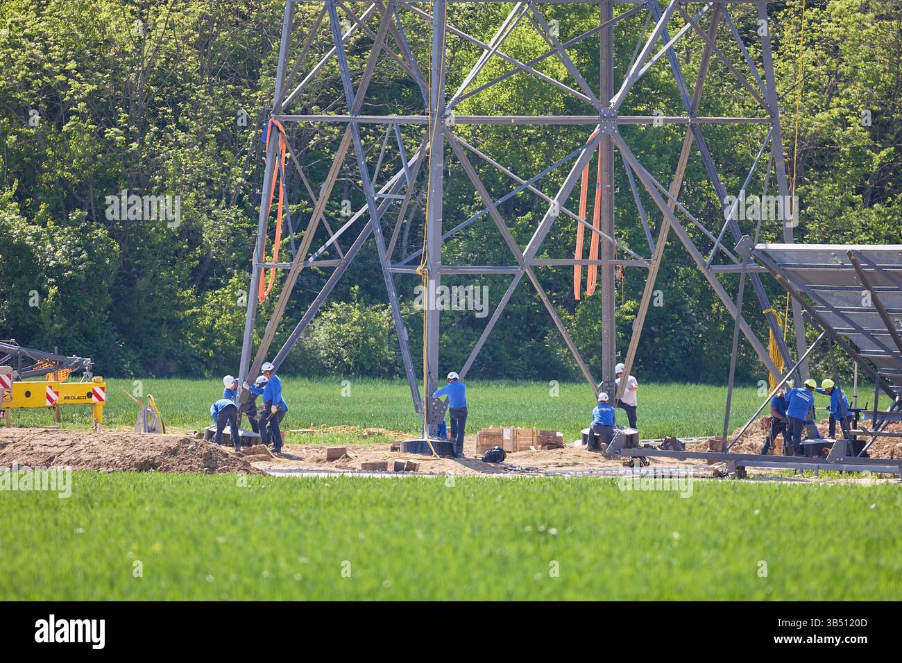 Construction & installation of a high-voltage line to supply power to ...