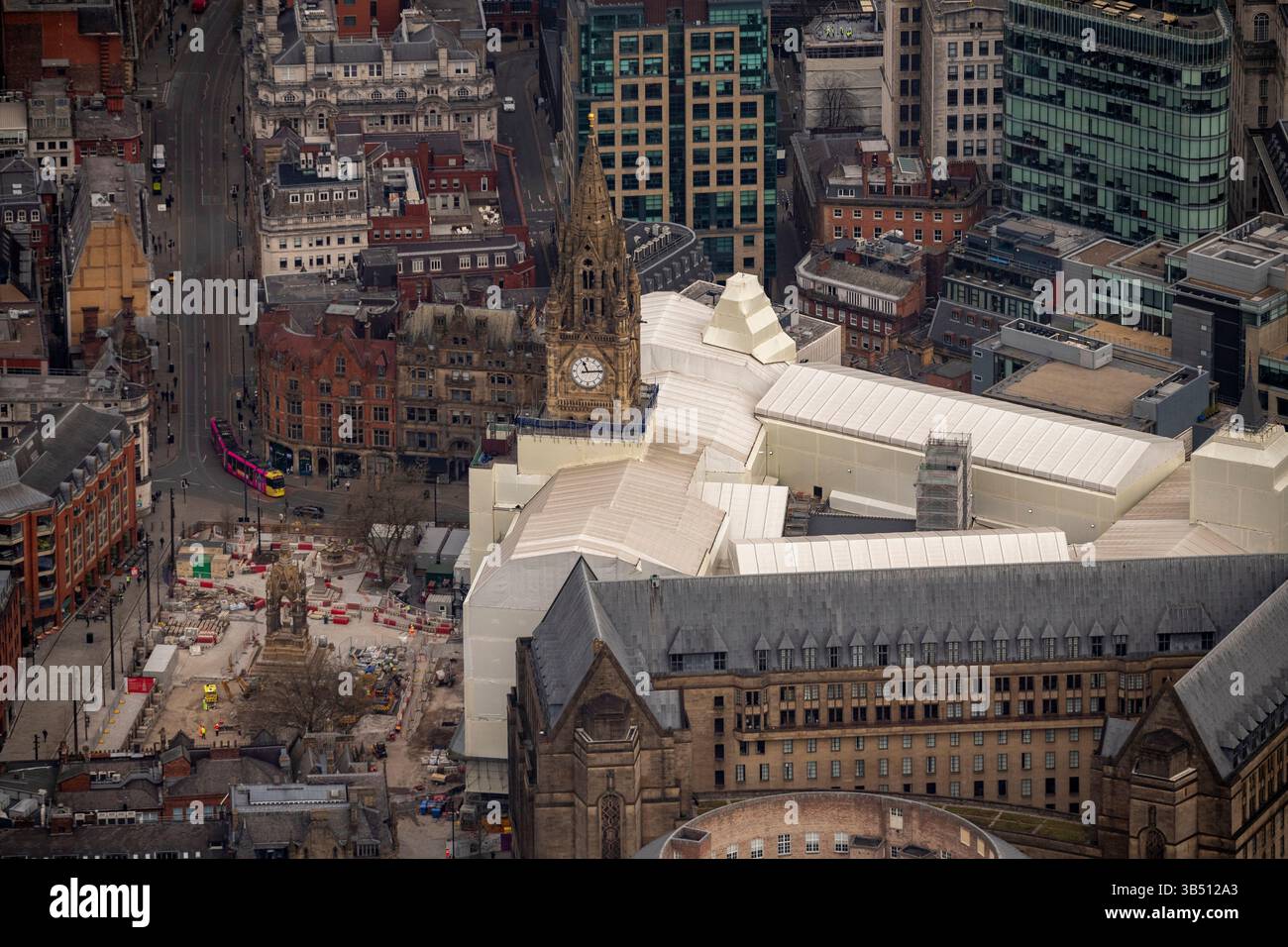 Aerial photograph of Manchester Town Hall with the clock tower emerging ...