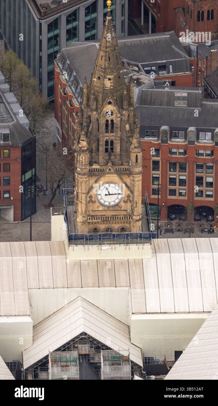 Aerial photograph of Manchester Town Hall with the clock tower emerging ...