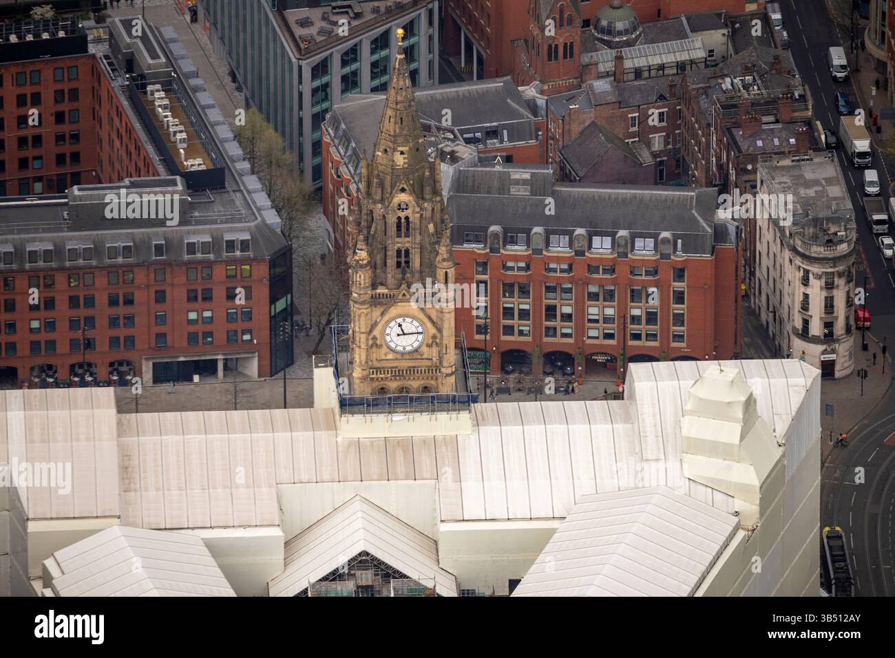 Aerial photograph of Manchester Town Hall with the clock tower emerging ...