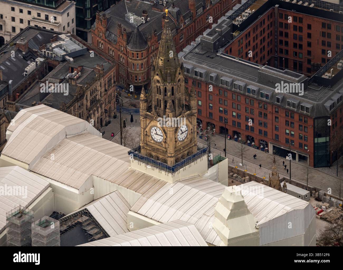 Aerial photograph of Manchester Town Hall with the clock tower emerging ...