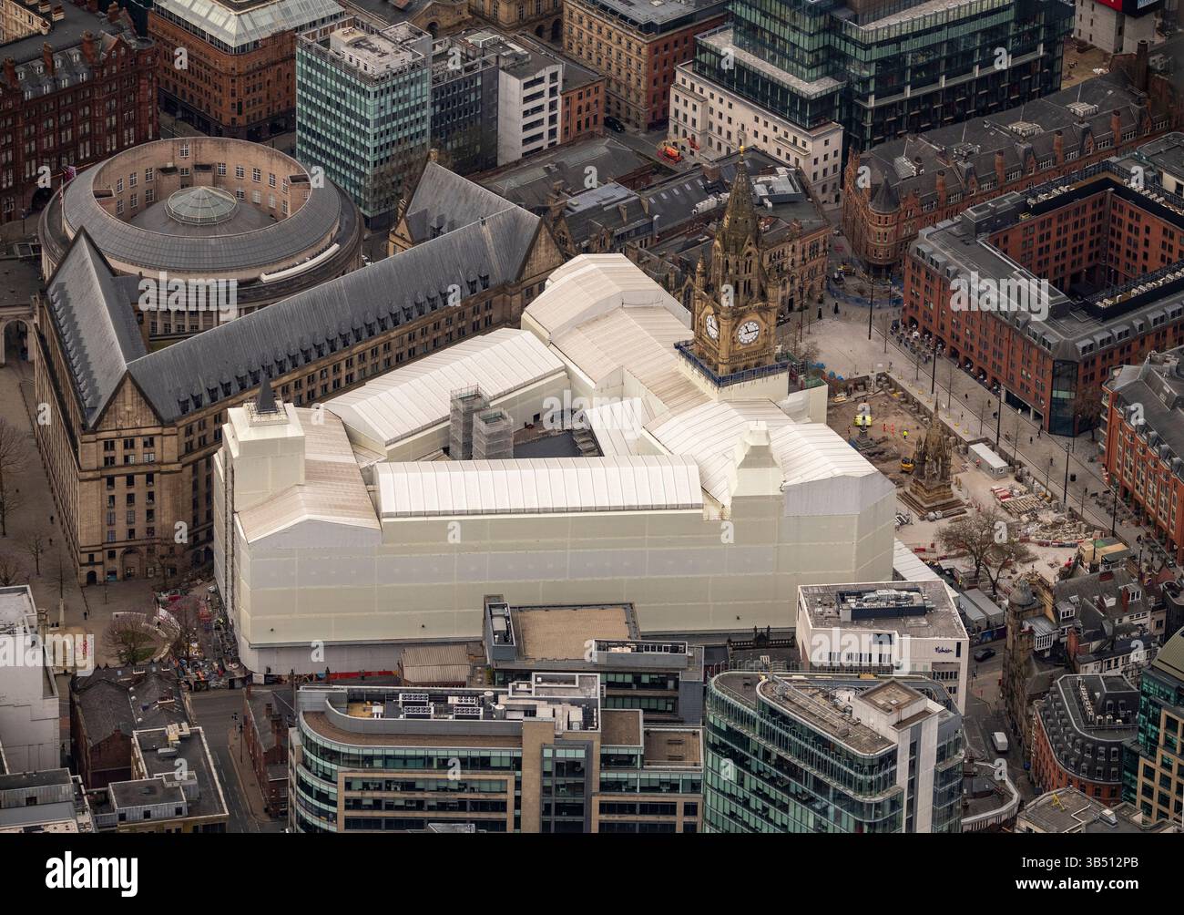 Aerial photograph of Manchester Town Hall with the clock tower emerging ...