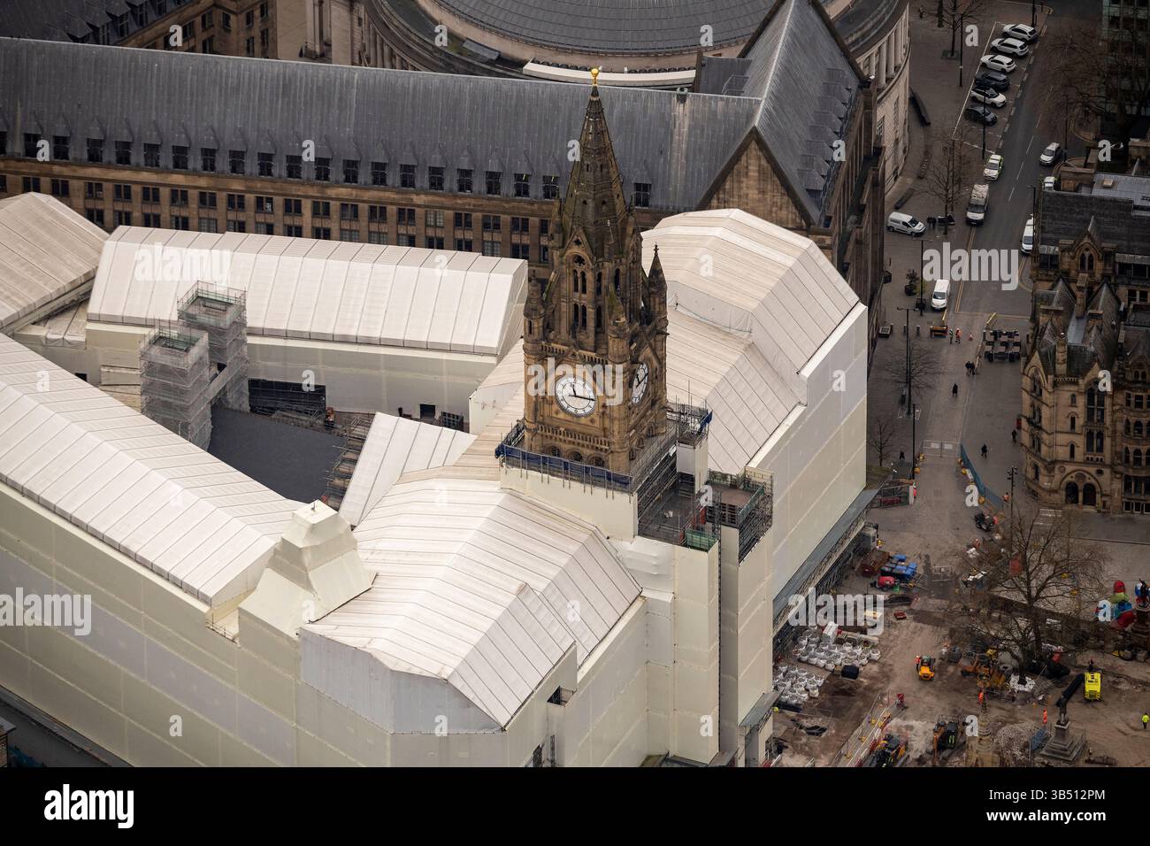 Aerial photograph of Manchester Town Hall with the clock tower emerging ...