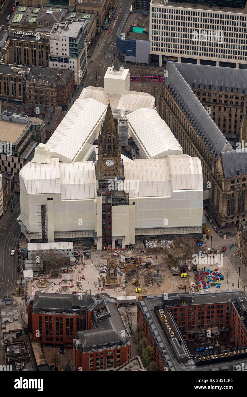Aerial photograph of Manchester Town Hall with the clock tower emerging ...