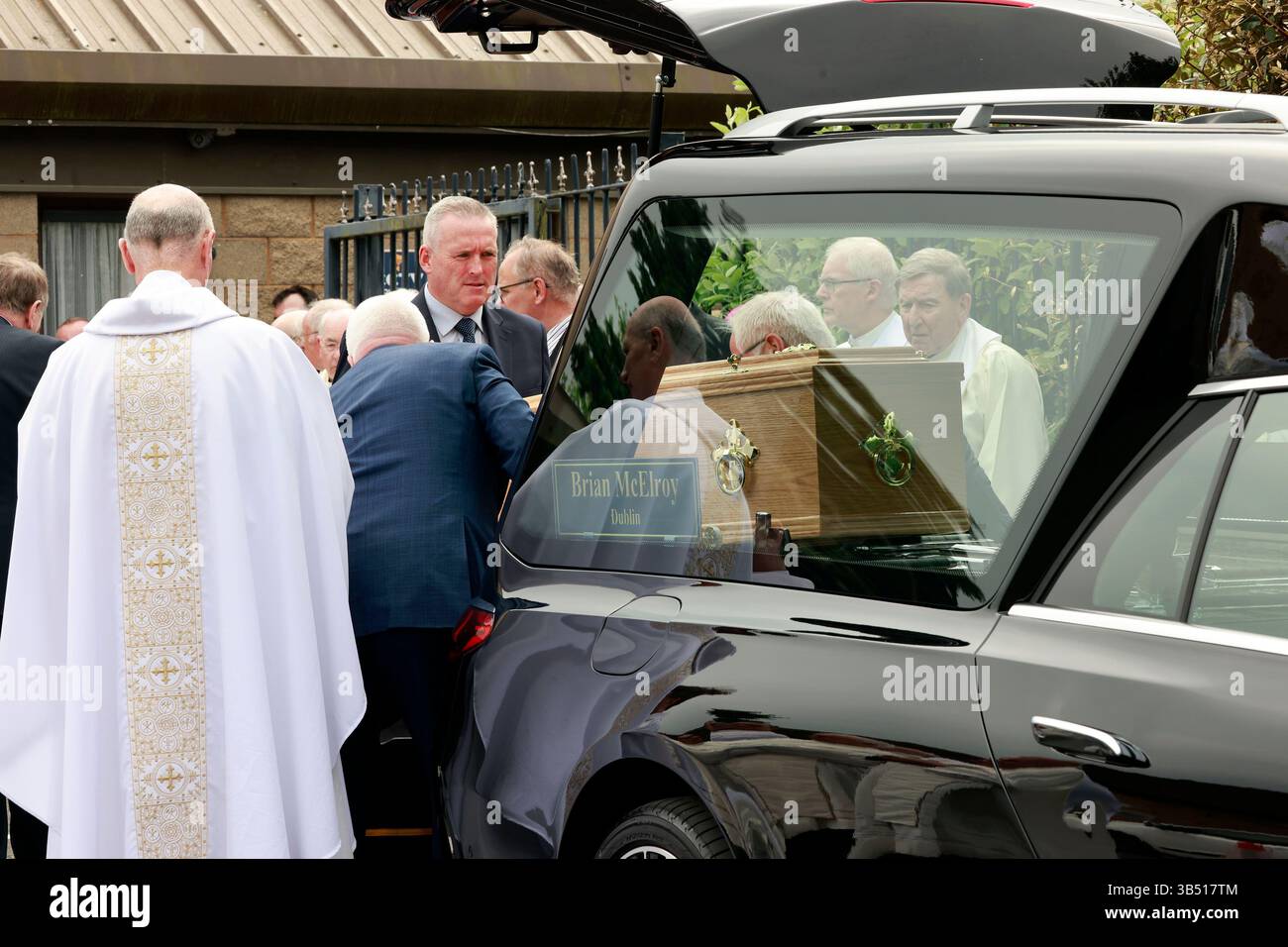 Mourners attend the funeral of Bishop Brendan Comiskey, who resigned ...