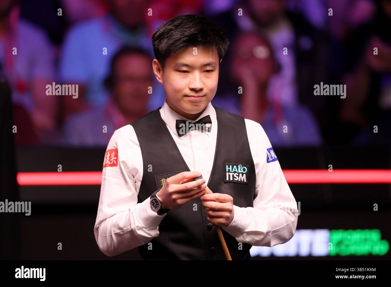 Zhao Xintong during his match against Ronnie O'Sullivan (not pictured) on day thirteen of the ...
