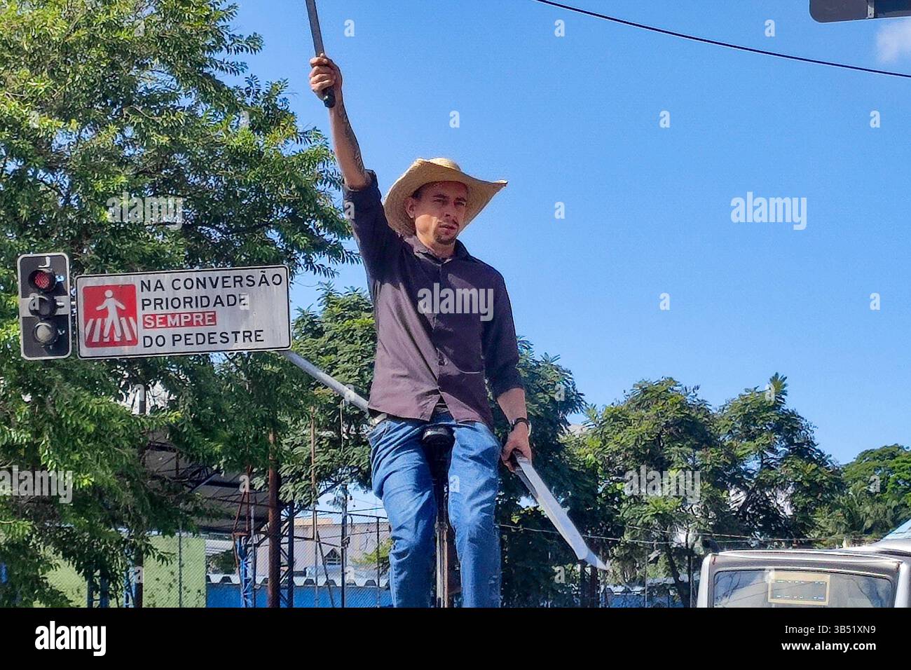 RECORD DATE NOT STATED Workers Day circus artist performs on the street ...