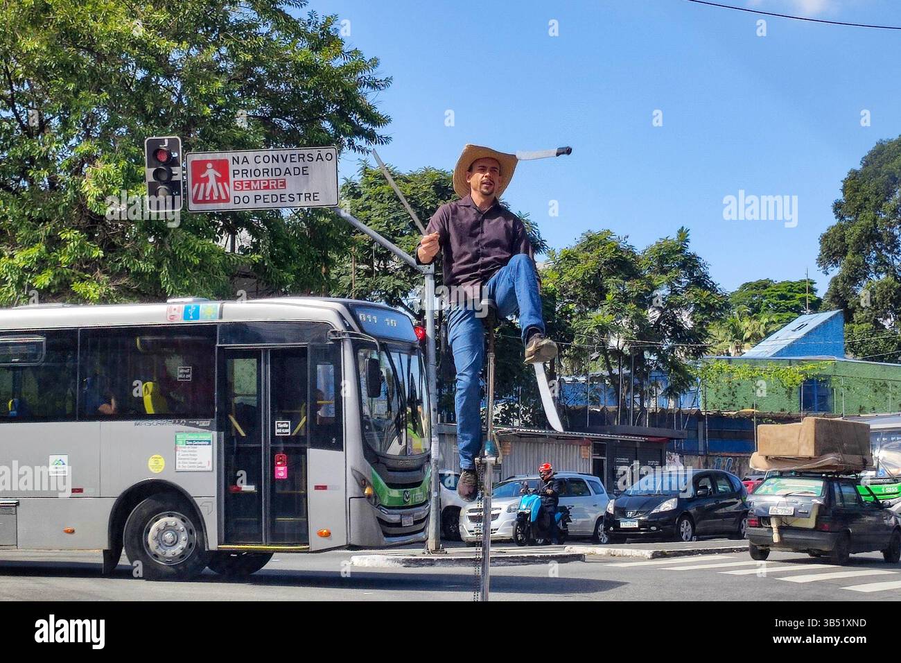 RECORD DATE NOT STATED Workers Day circus artist performs on the street ...