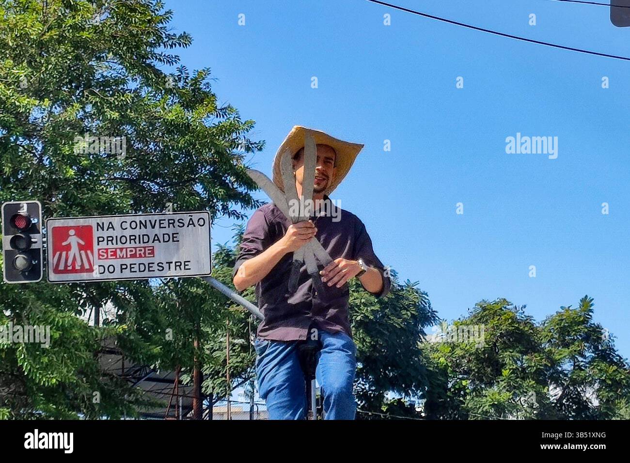 RECORD DATE NOT STATED Workers Day circus artist performs on the street ...