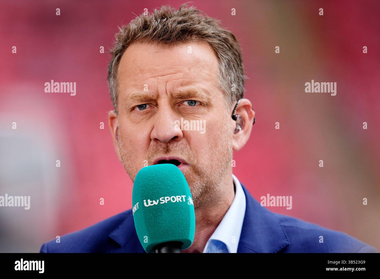 Presenter Mark Pougatch during the Emirates FA Cup Semi Final match at ...