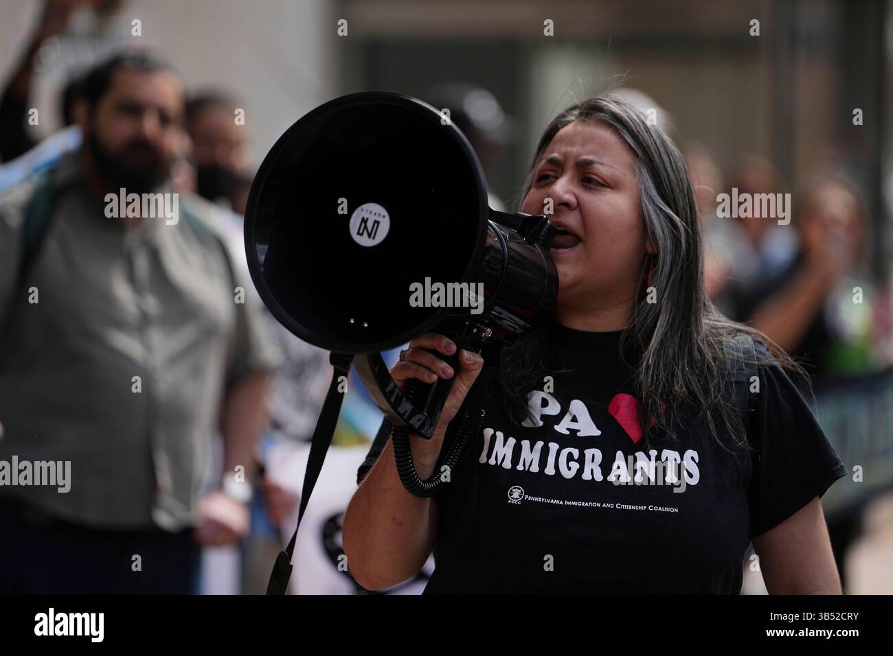 Immigrant rights supporters demonstrate during a May Day rally in ...