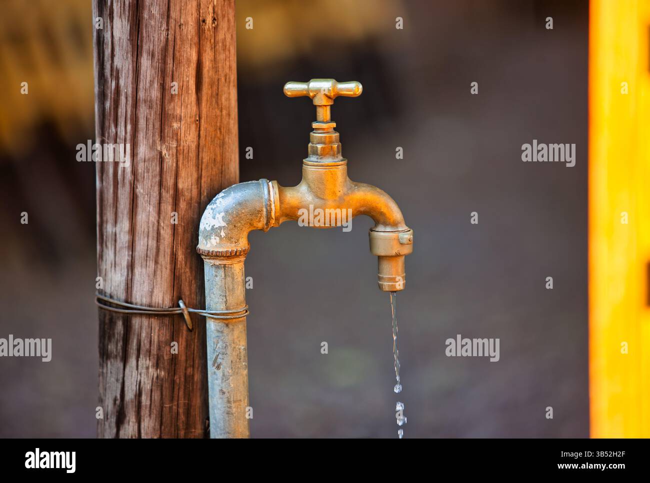 water shortages in africa, tap in the yard outside in a village in ...