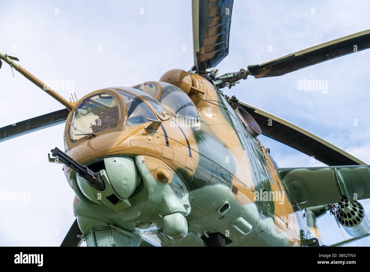Camouflaged Mi-24 Soviet military attack helicopter in low flight Stock ...