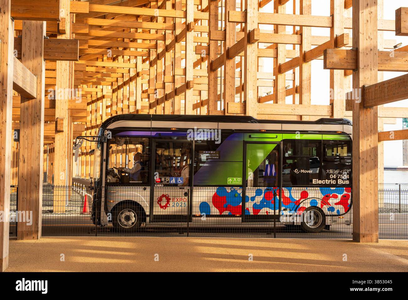 Osaka, Japan - April 30 2025 : The 'e-mover' EV shuttle bus in motion ...