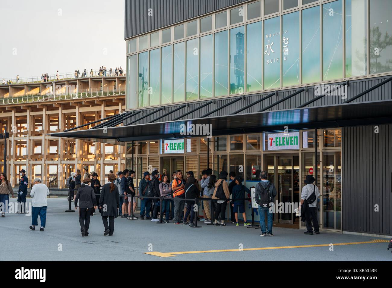 Osaka, Japan - April 30 2025 : Visitors queueing outside the 7-Eleven ...