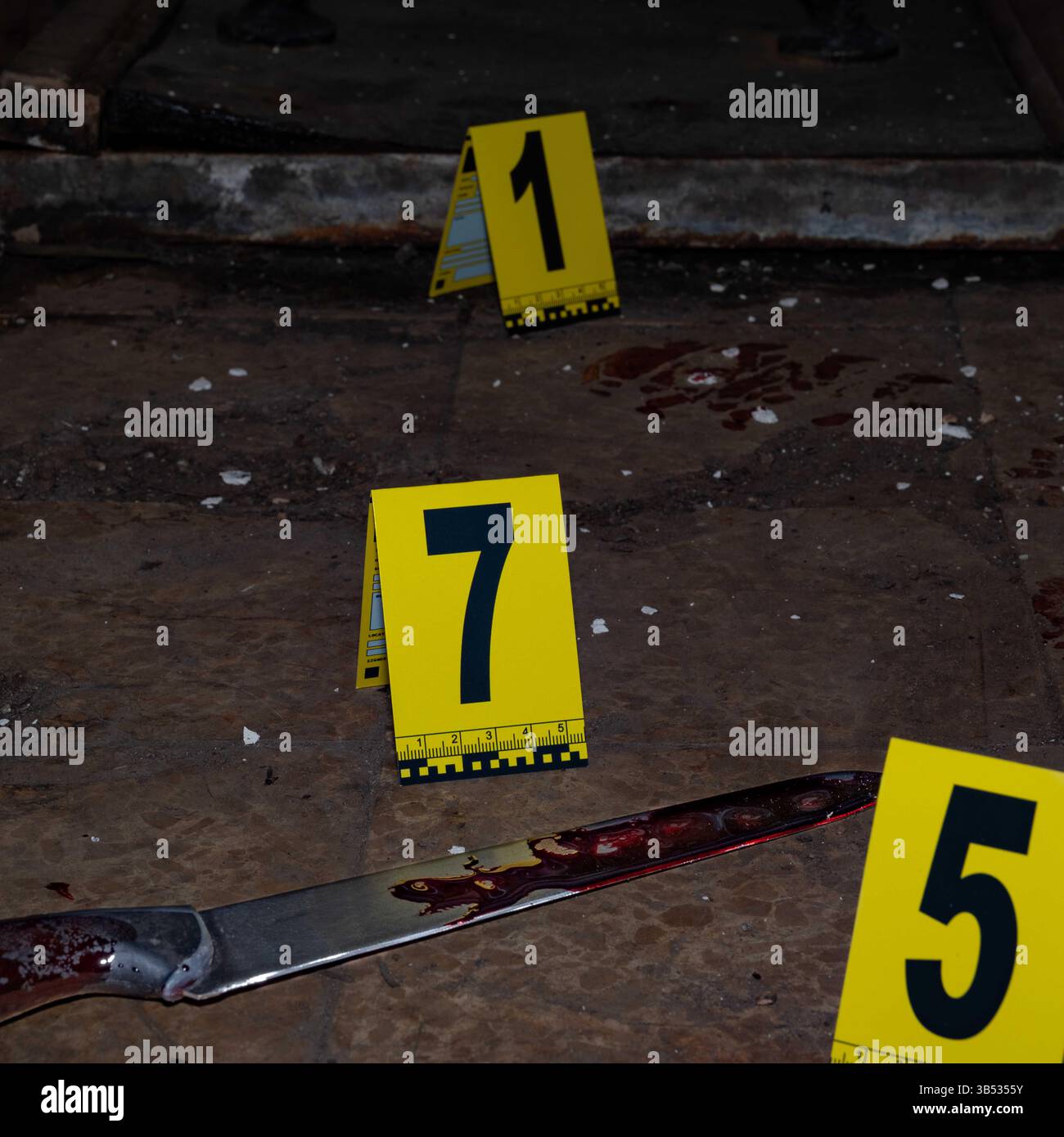 Bloody handprint and bloody knife at crime scene with yellow evidence ...