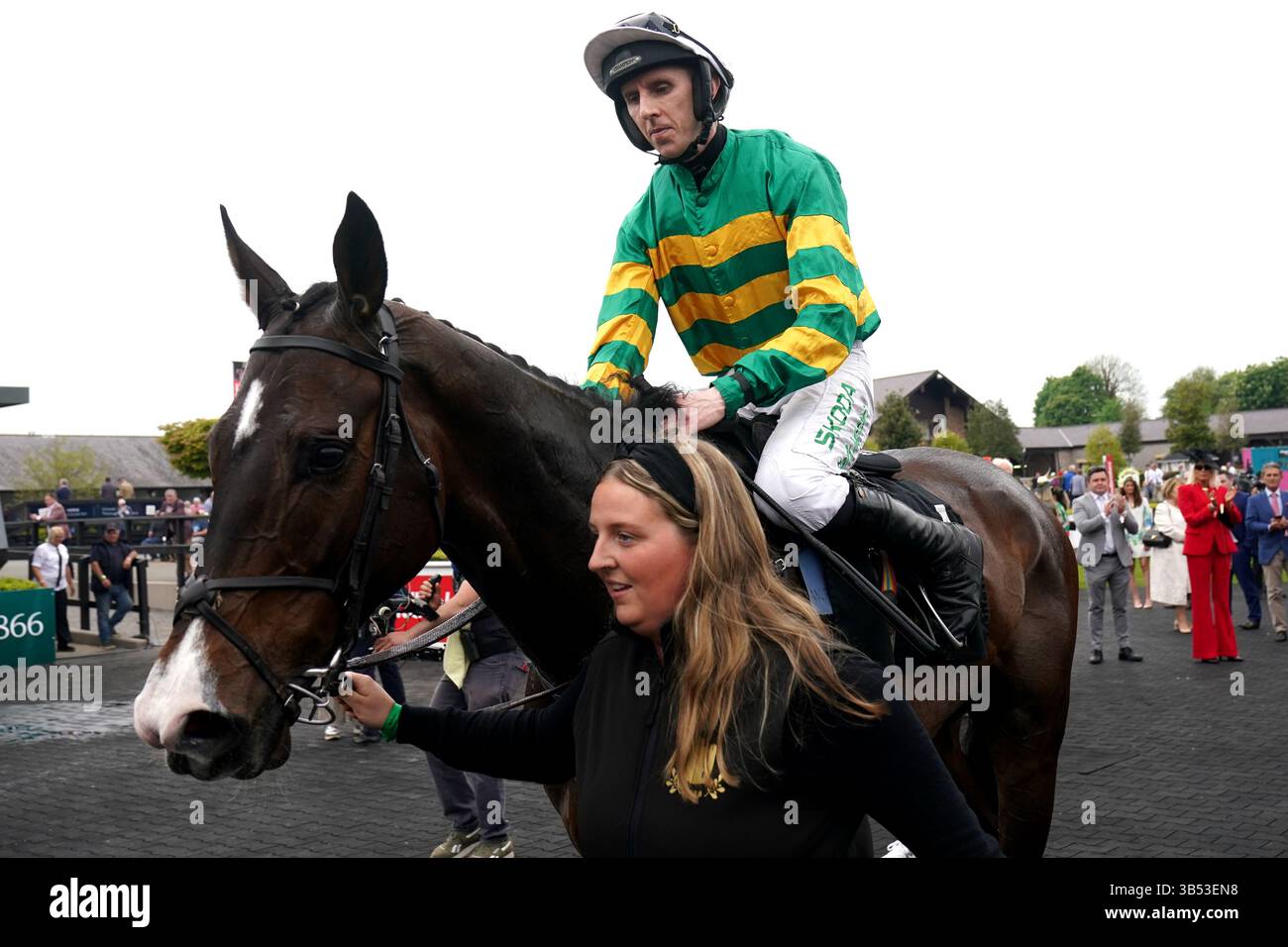 Jockey Mark Walsh celebrates after winning the Barberstown Castle ...