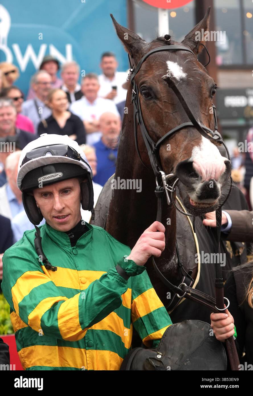 Jockey Mark Walsh celebrates after winning the Barberstown Castle ...
