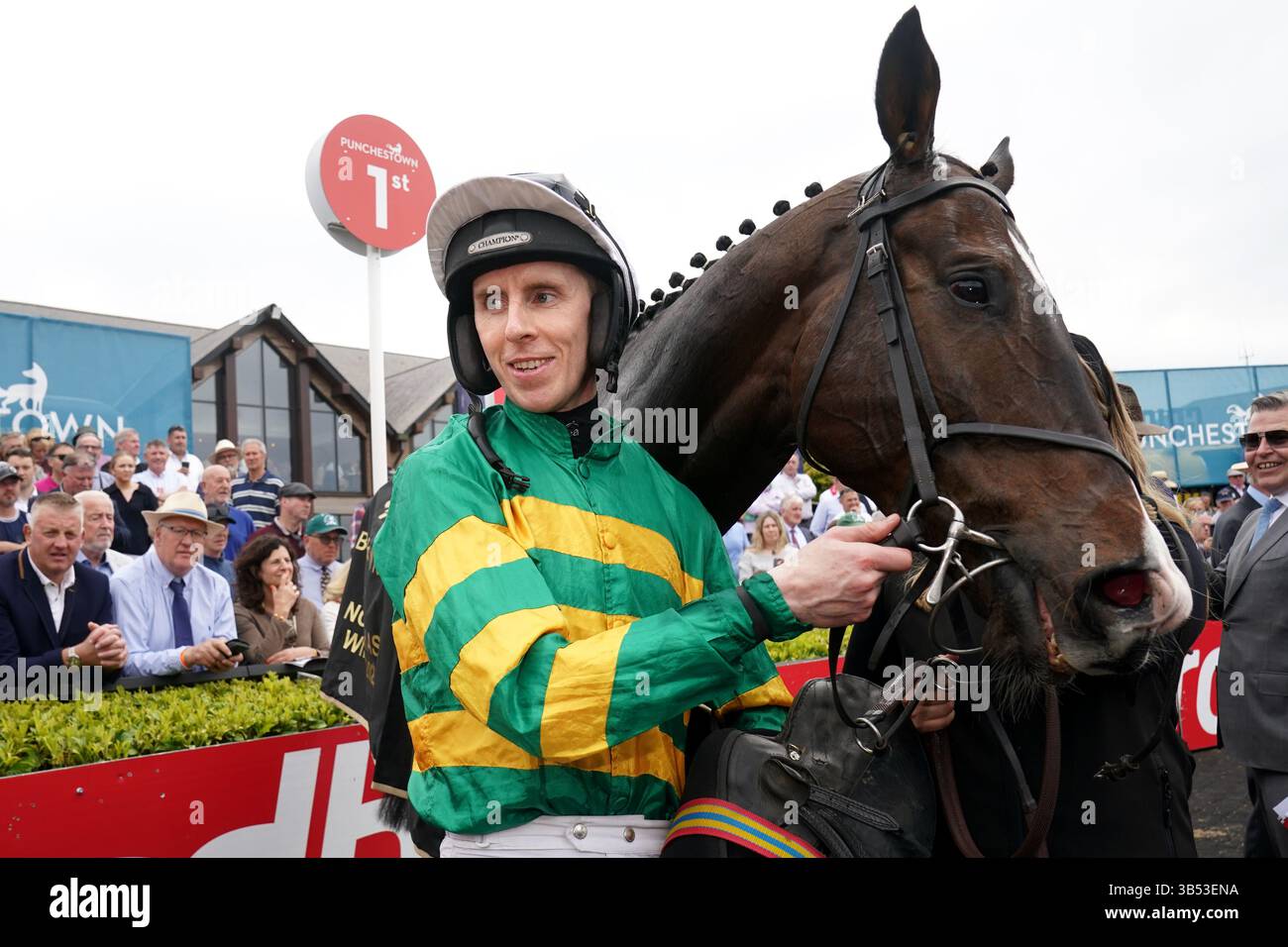 Jockey Mark Walsh celebrates after winning the Barberstown Castle ...