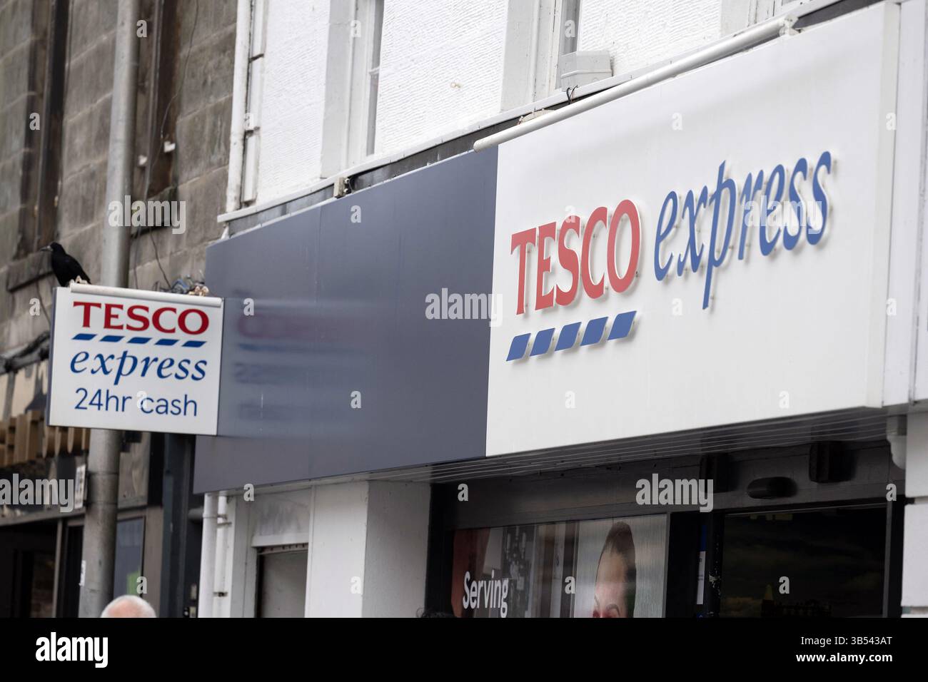 A shop sign of TESCO express Store, on May 02, 2025 in St Andrews ...