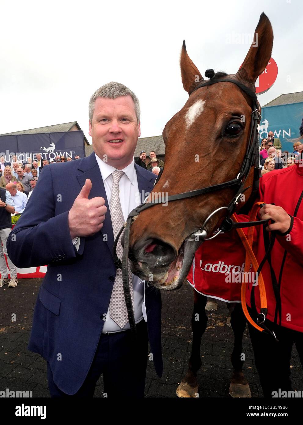Trainer Gordon Elliott with horse Teahupoo after victory in the ...
