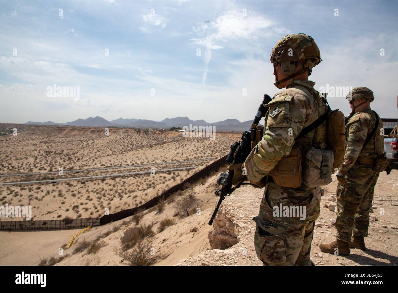 Spc. Paulo Lopes, left, and Spc. Roush Sean, right, both from the 1st ...