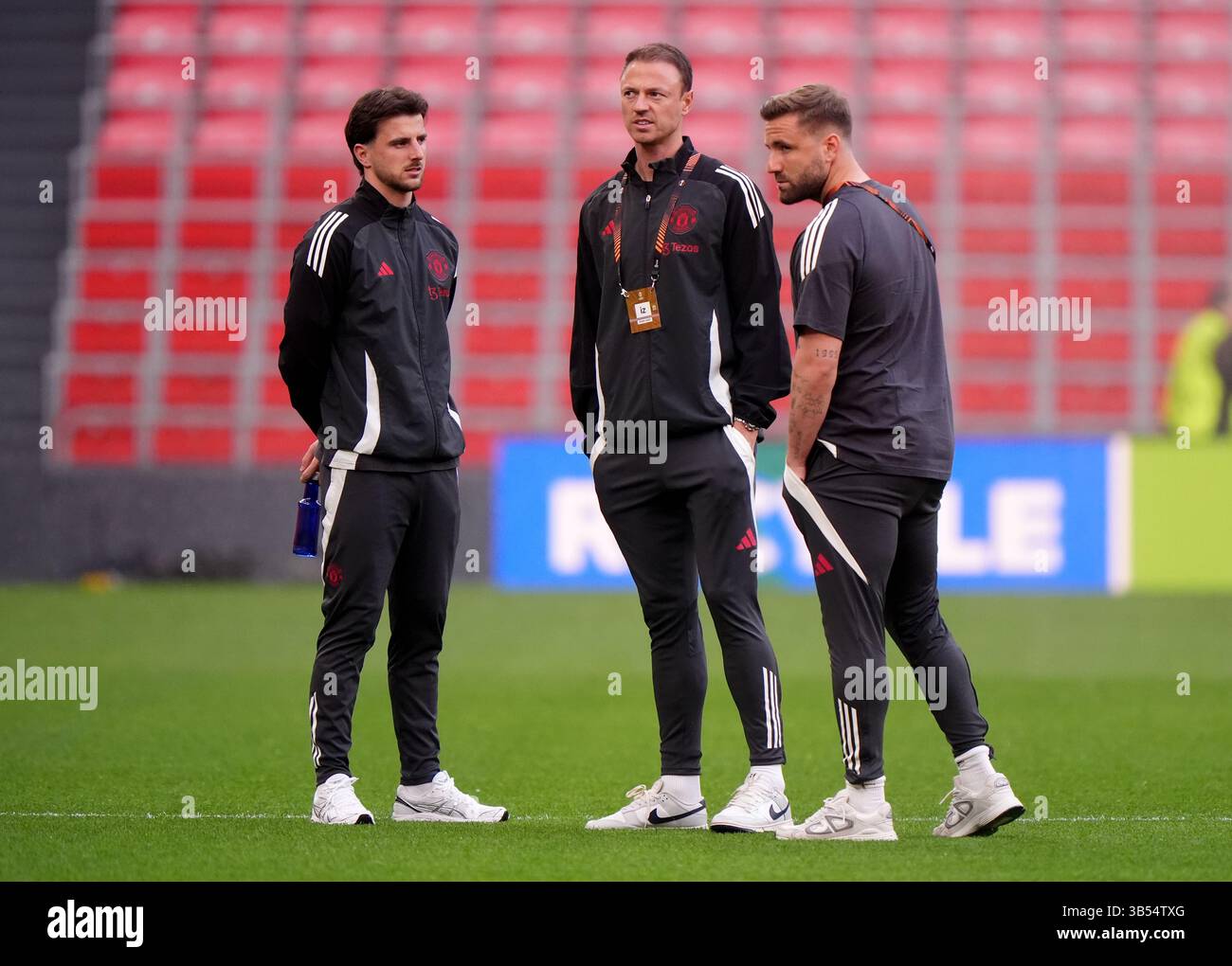 Manchester United's Mason Mount (left), Jonny Evans (centre) and Luke ...