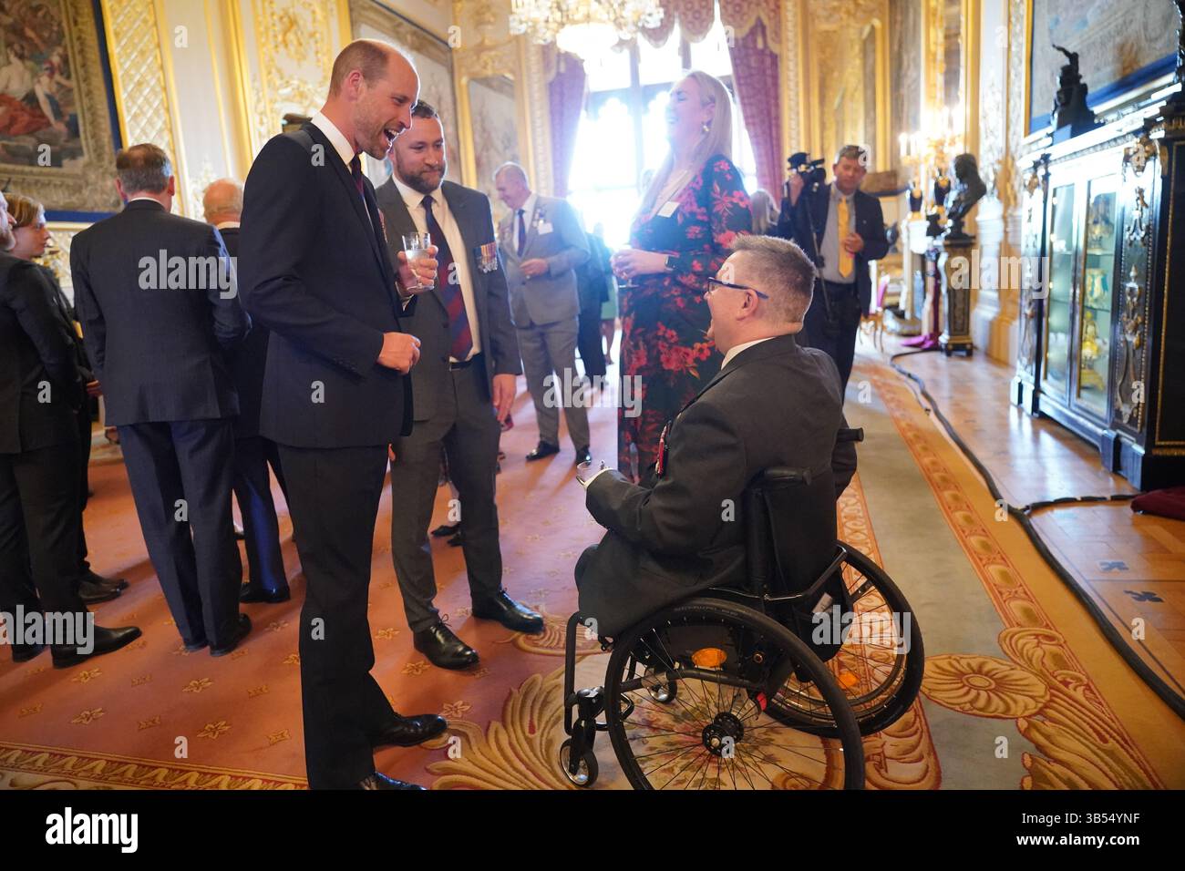 The Prince of Wales talking to Major Peter Norton during a reception ...
